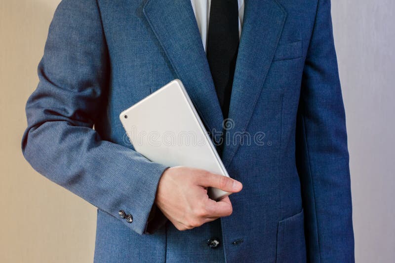 Businessman in a Jacket Holding a Tablet Stock Photo - Image of person ...