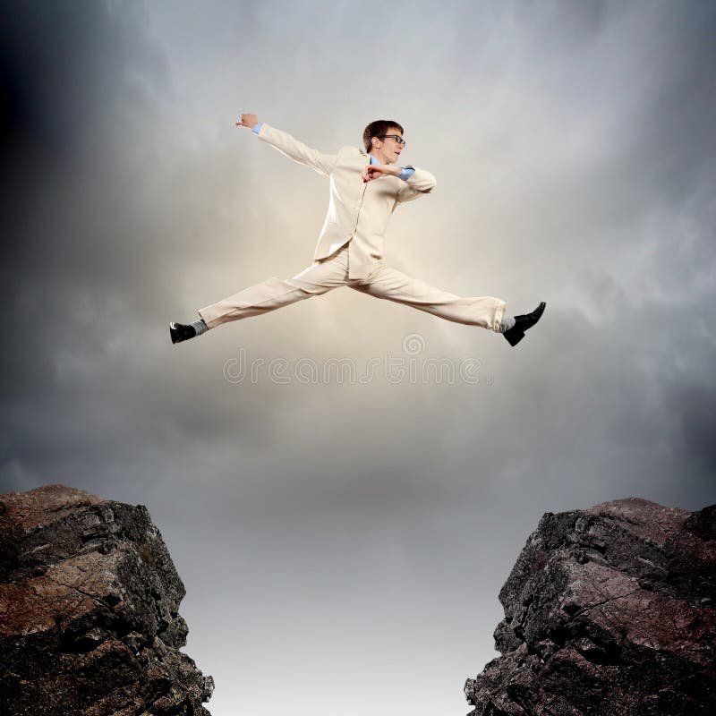 Businessman Jumping Over Gap Stock Photo - Image of executive ...