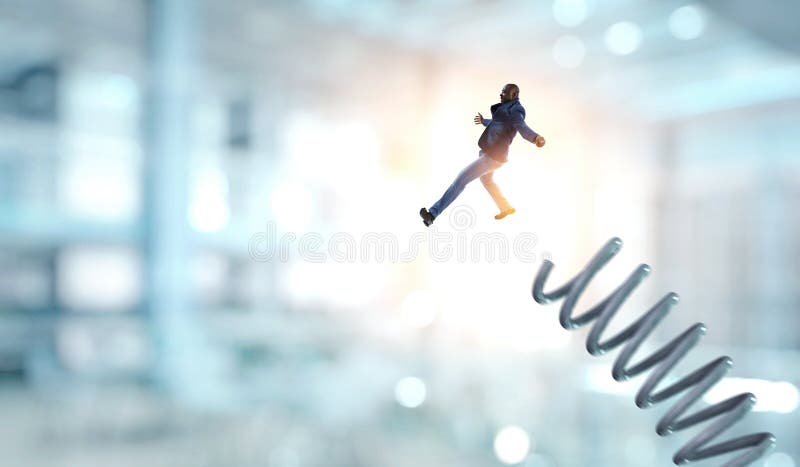 Businessman Jumping on Springboard . Mixed Media Stock Image - Image of ...