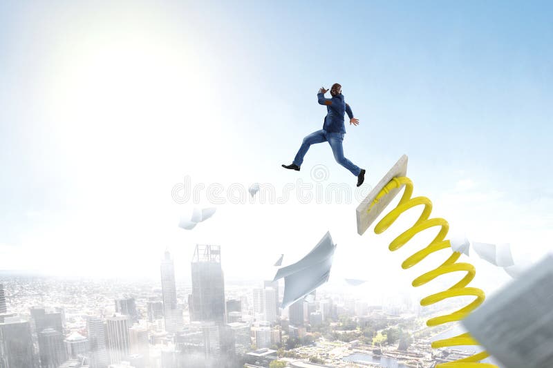 Businessman Jumping on Springboard . Mixed Media Stock Image - Image of ...