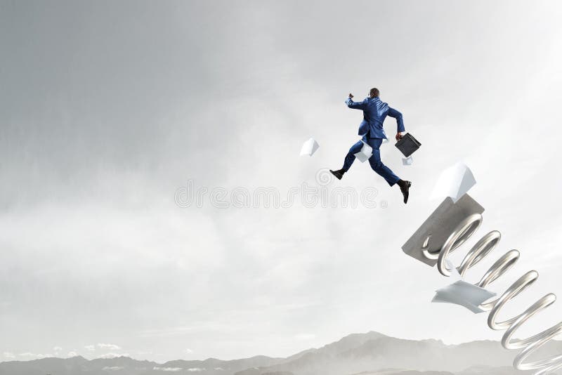 Businessman Jumping on Springboard . Mixed Media Stock Image - Image of ...