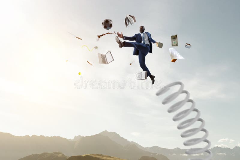 Businessman Jumping on Springboard . Mixed Media Stock Image - Image of ...