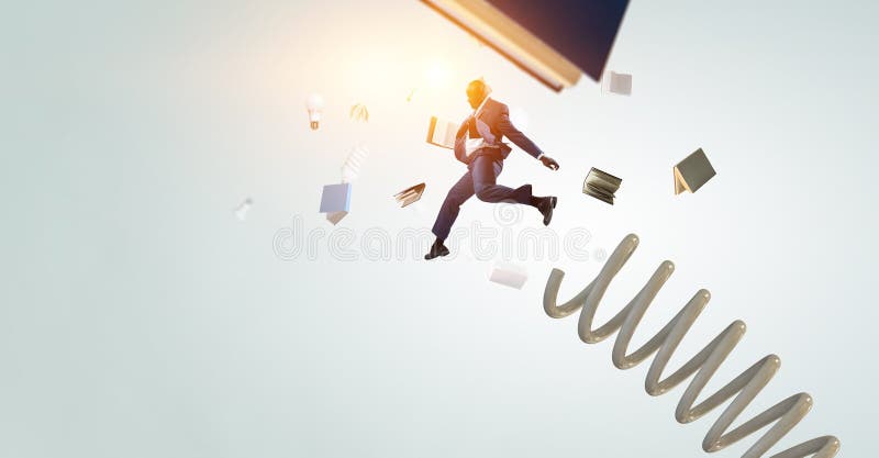 Businessman Jumping on Springboard . Mixed Media Stock Photo - Image of ...