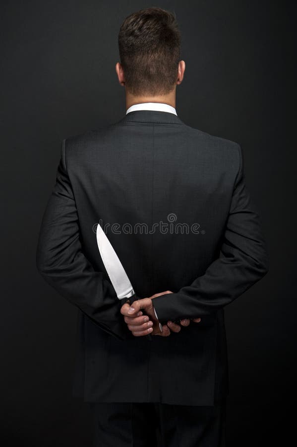 Man Holding Knife Behind Back Stock Photos - Free & Royalty-Free Stock ...