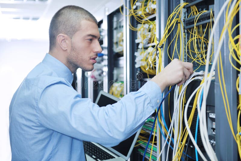 Businessman with Laptop in Network Server Room Stock Image - Image of ...