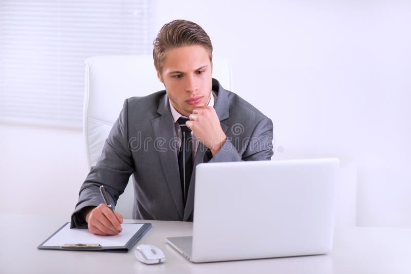 Businessman with laptop stock image. Image of contemporary - 67775915