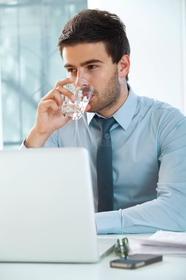 Businessman with Laptop Working in Office Stock Photo - Image of good ...
