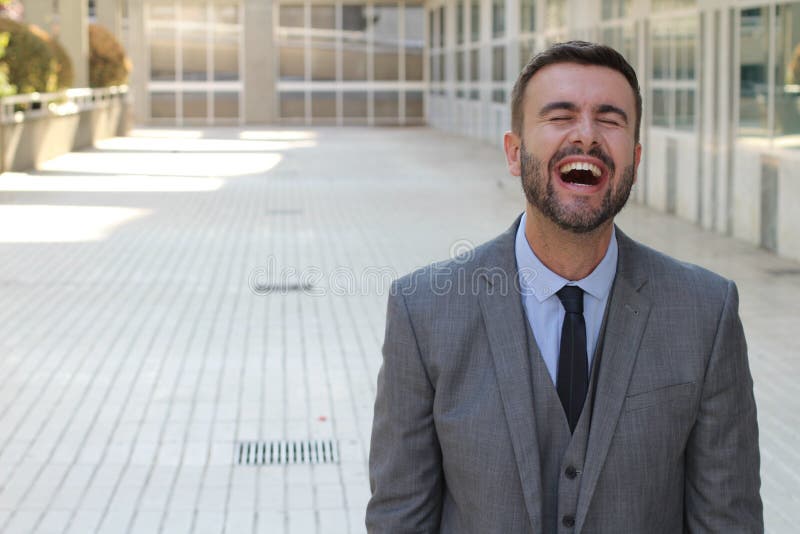 Businessman Laughing really Hard at Work Stock Photo - Image of ...