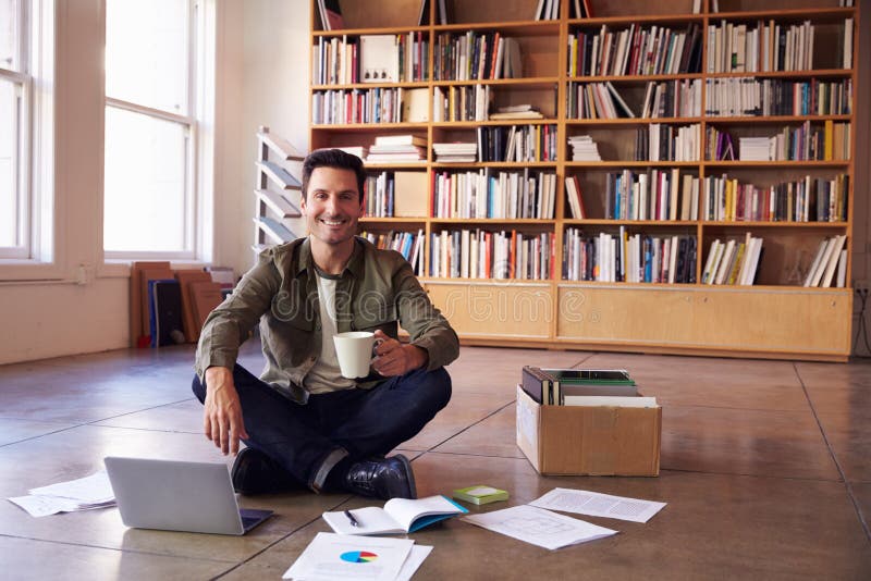 Businessman Laying Documents on Floor To Plan Project Stock Image ...