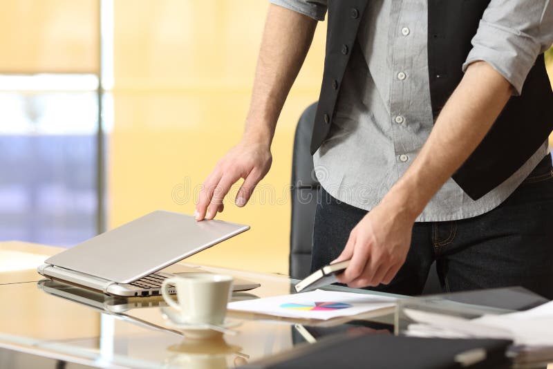 Businessman Leaving Work at Office Stock Image - Image of computer ...