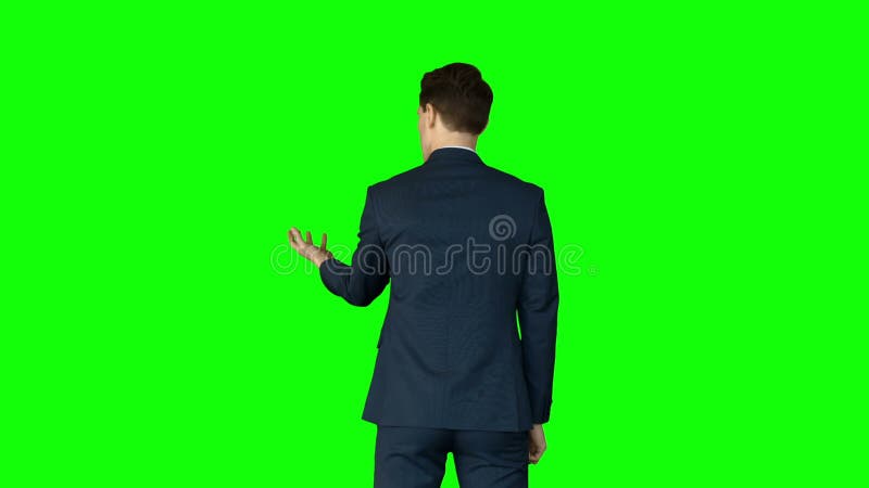 Businessman Lifting Something on His Hand on Green Screen Stock Video ...