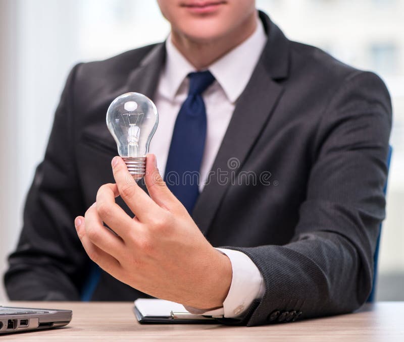Businessman with Light Bulb in Idea Concept Stock Photo - Image of ...