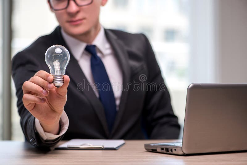 The Businessman with Light Bulb in Idea Concept Stock Image - Image of ...
