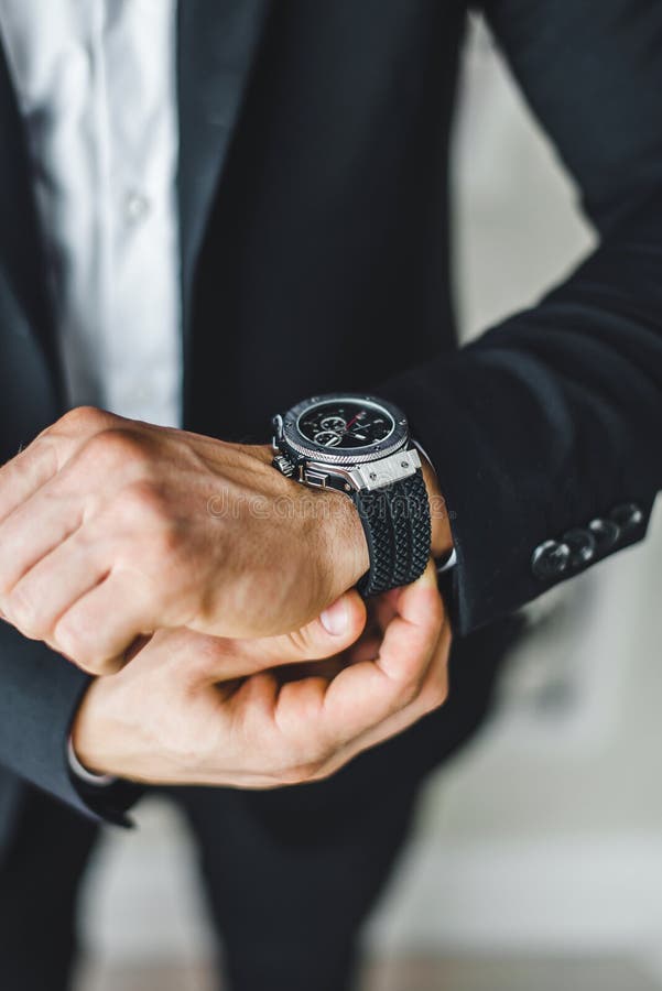 Businessman Looking at His Watch. Stock Image - Image of looking ...