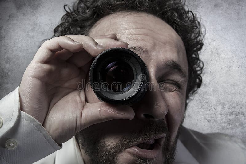 Businessman Looking through a Lens, Man in White Shirt with Funny ...