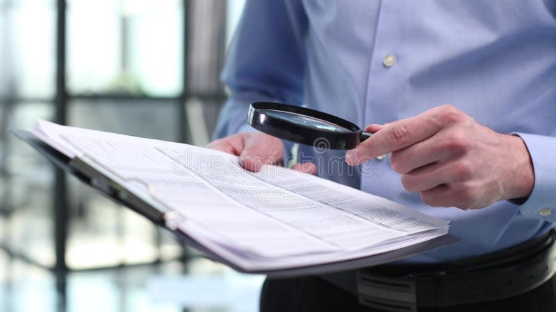 Magnifying Glass Looking at Numbers Close-up Stock Video - Video of ...