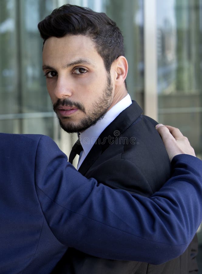 Businessman Looking Over His Shoulder at Camera Stock Image - Image of ...