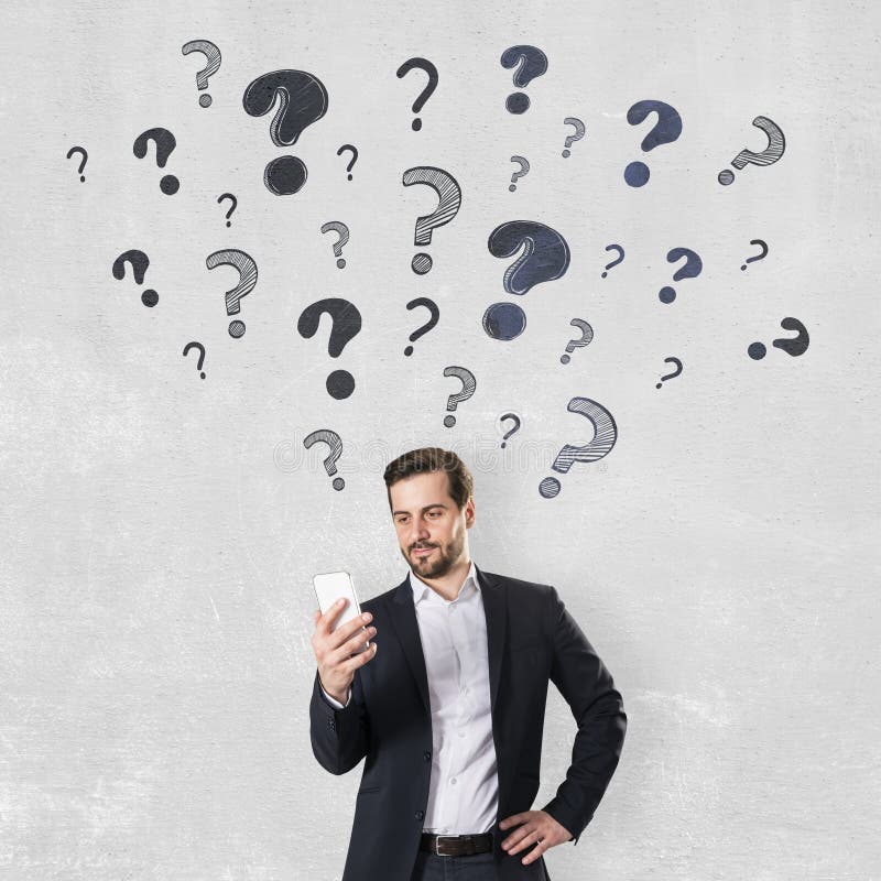 Businessman Looking at Phone with Question Marks Above Head on Light ...