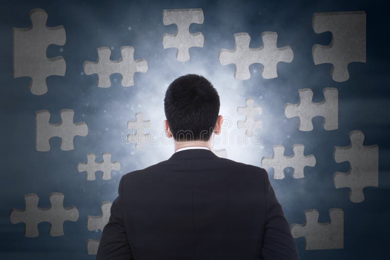Businessman Figuring Out Puzzle Pieces Stock Image - Image of graphic ... Businessman Figuring Out Puzzle Pieces Stock Image - Image of graphic ...