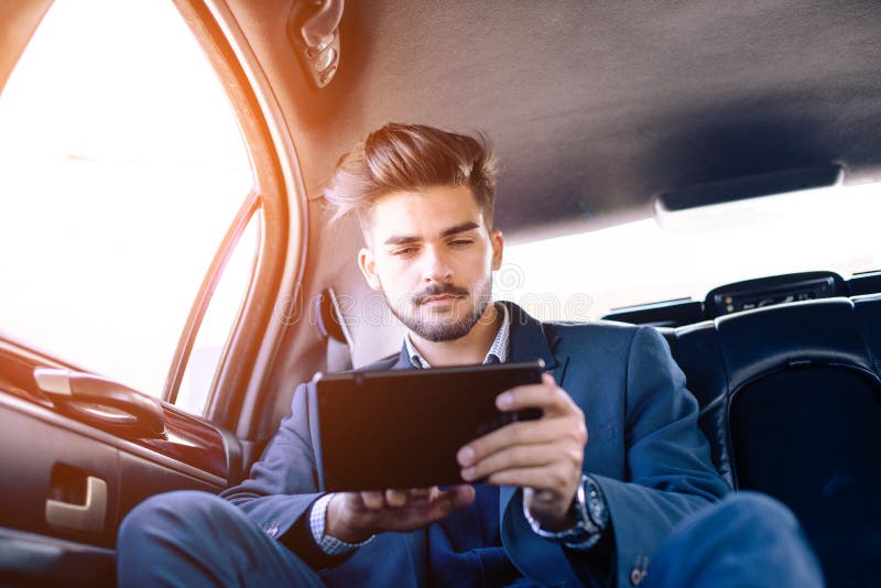 Businessman Looking at Tablet Stock Photo - Image of ethnicity, arts ...