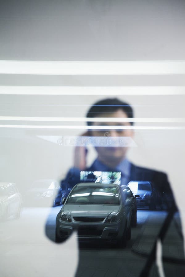 Businessman Looking Thorough Window Parking Garage Reflection Car Stock ...