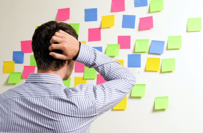 Businessman Looking Wall Sticky Notes Hands Behind Head Stock Photos ...