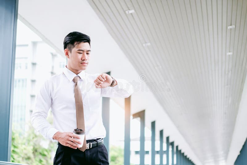 Businessman Looking at Watch he Looks on the Time Stock Photo - Image ...