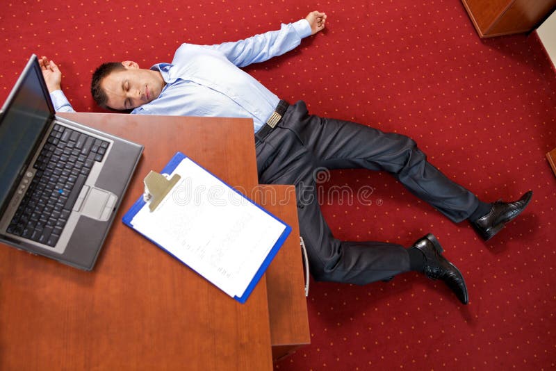 Businessman Lying in the Office Stock Photo - Image of office, desk ...