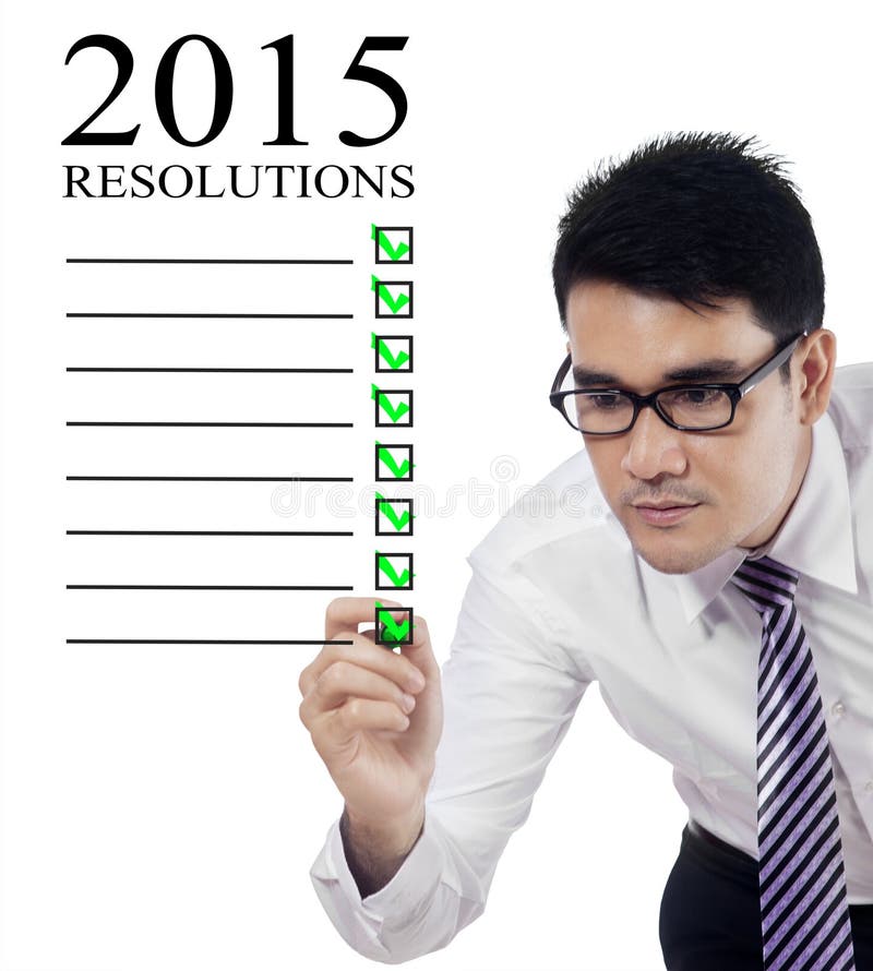 Businessman Makes a List of Resolution Stock Photo - Image of ...