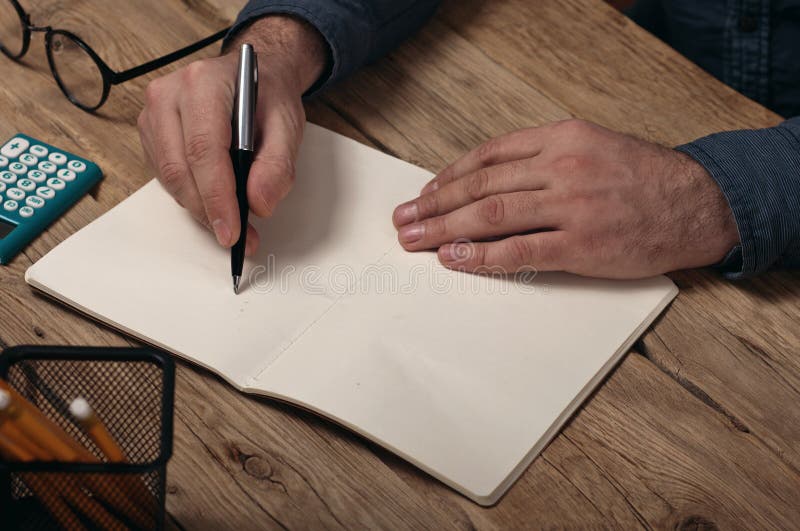 Businessman Makes a Note at Notebook Stock Image - Image of economy ...
