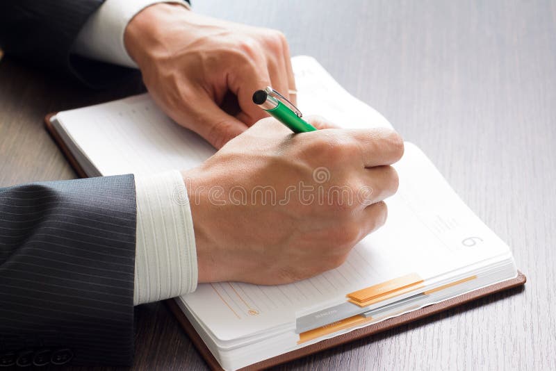 Businessman Writing a Letter or Signing Stock Photo - Image of ...