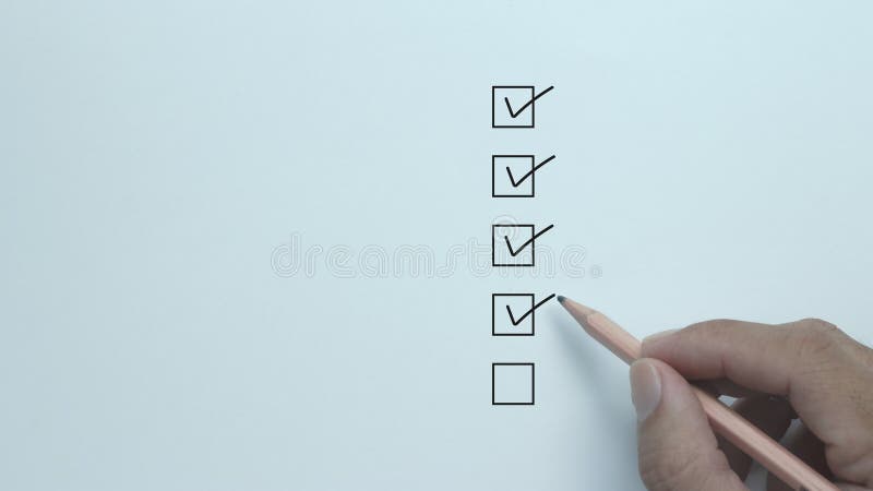 Businessman Making Correct Mark in Check Box for Document Quality ...