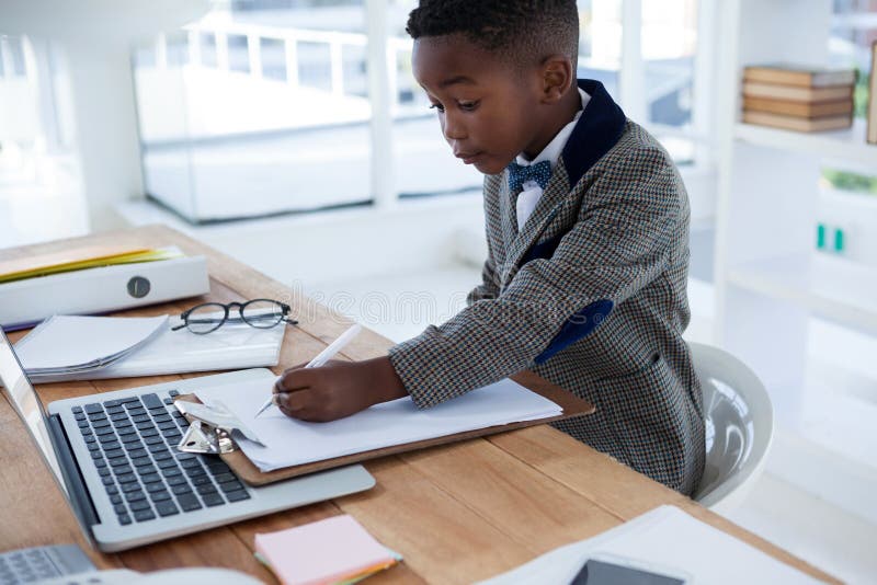 Businessman Making Face while Writing on Paper Stock Photo - Image of ...