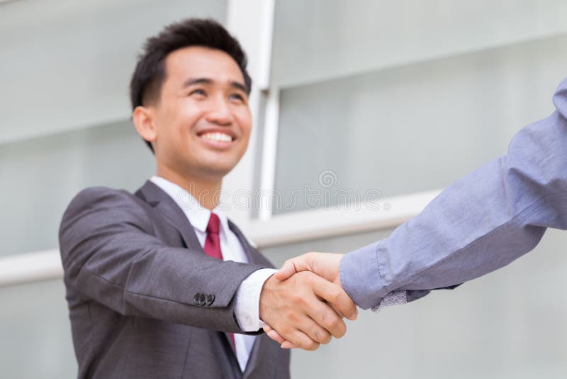 Businessman Making Handshake Stock Image - Image of hand, agree: 66108979
