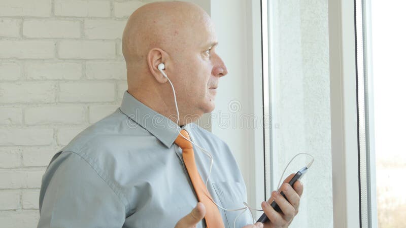 Businessman Making a Phone Call Using Cellphone Hands-free Stock Image ...