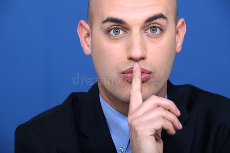 Businessman Making Shush Gesture Stock Photo - Image of graduate ...
