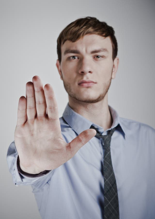 Businessman making stop stock photo. Image of male, confident - 22726964