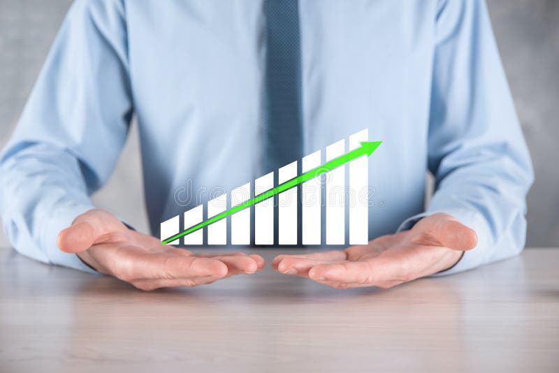 Businessman Man Holding a Graph with Positive Profits Growth. Plan ...