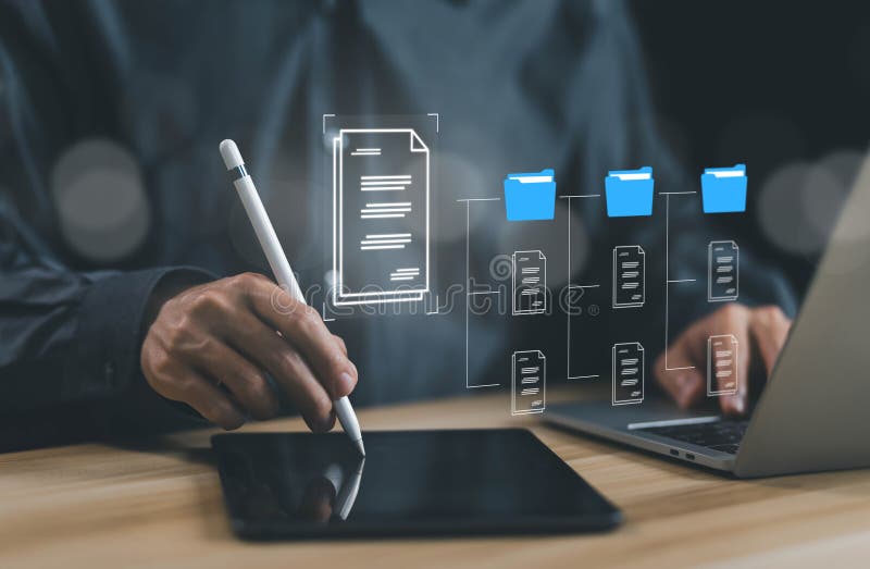 Businessman Manages Data Document Electronic Files Digital on a Laptop ...