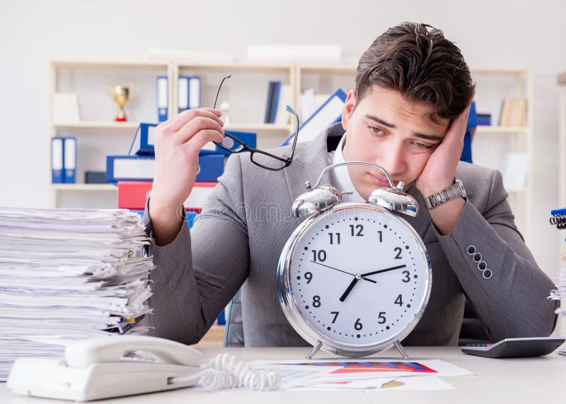 Businessman Missing Deadlines Due To Excessive Work Stock Photo - Image ...