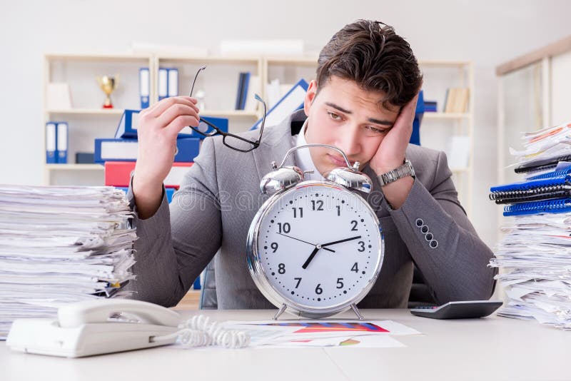 The Businessman Missing Deadlines Due To Excessive Work Stock Photo ...