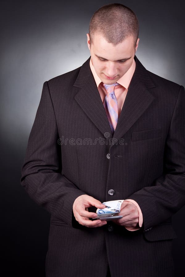 Businessman with money stock image. Image of ambitious - 33061979