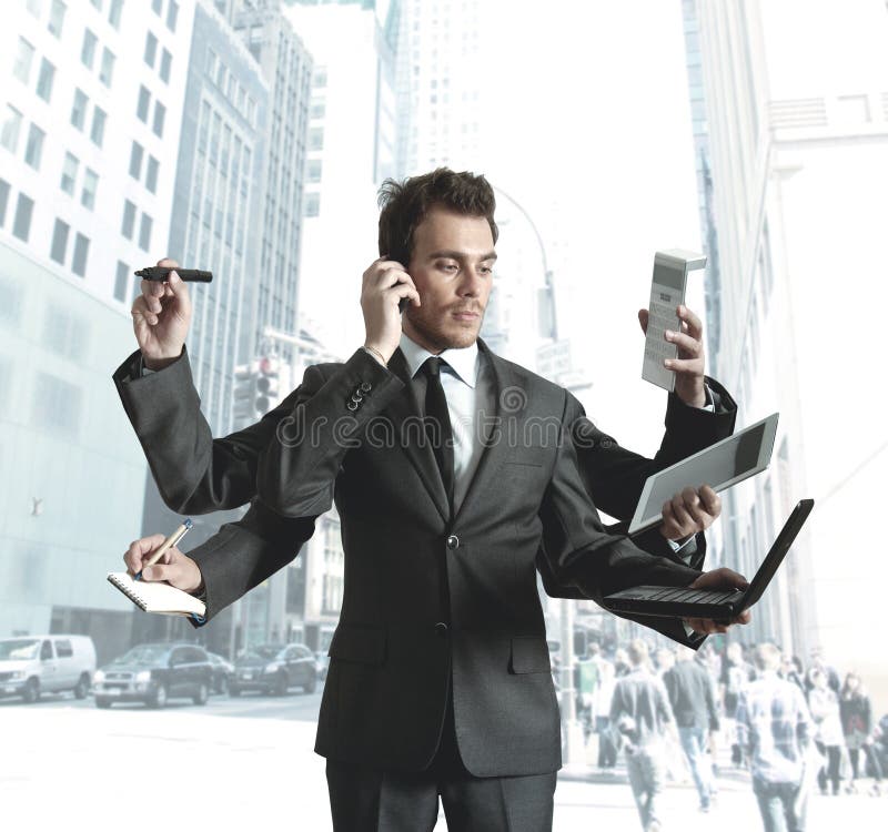 Businessman multitasking stock image. Image of mobile - 25641023