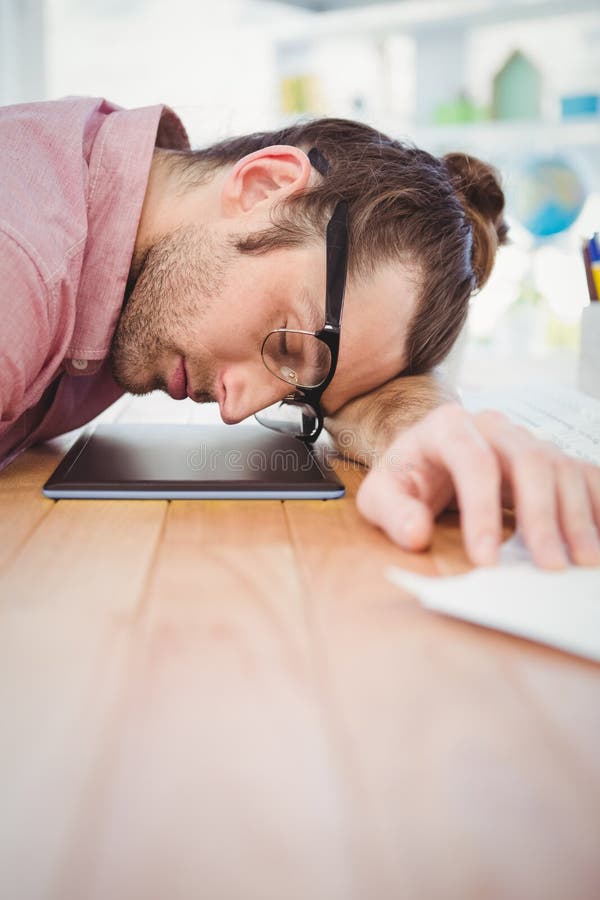 Man napping on his desk stock image. Image of napping - 30885825