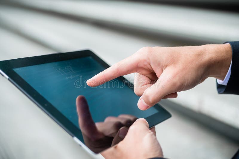 Businessman Navigating on a Tablet Computer Stock Image - Image of ...