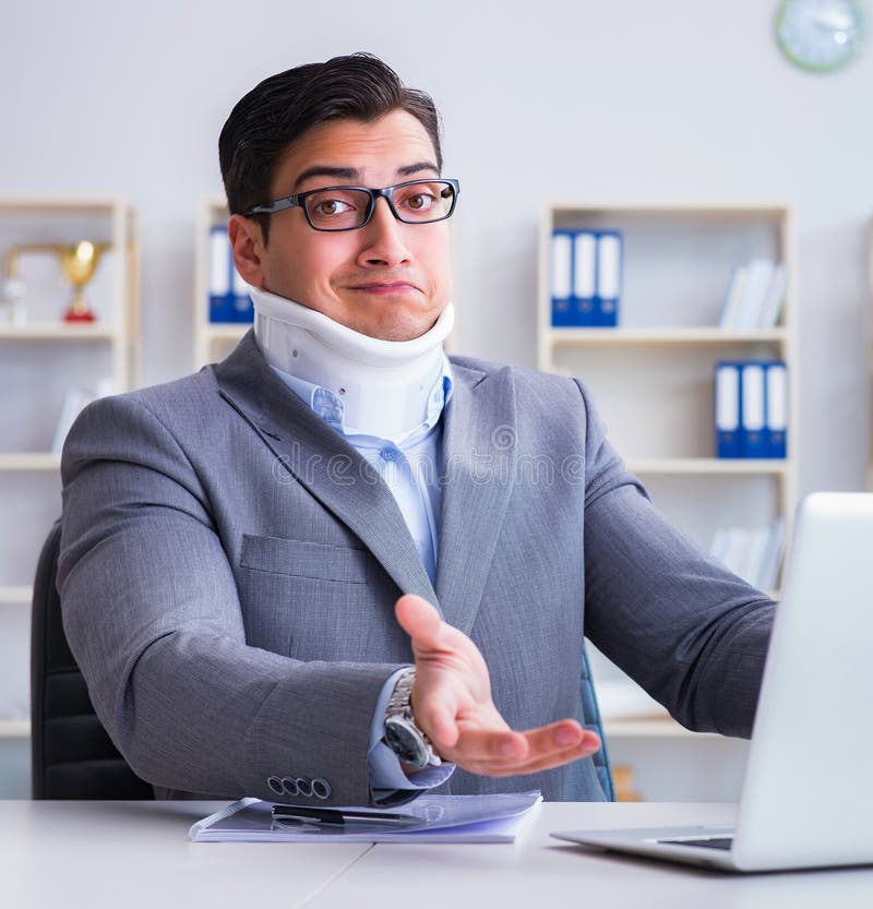 Businessman with Neck Injury Working in the Office Stock Photo - Image ...