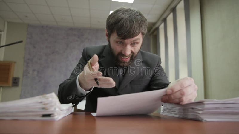 Businessman Nervously Signing and Stamping Incoming Documents. Office ...