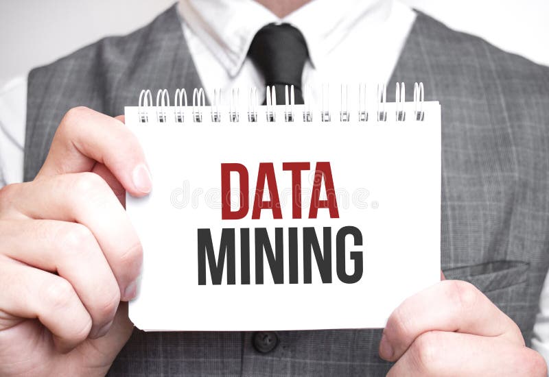 Businessman with Notebook with Text DATA MINING . Business Concept ... Businessman with Notebook with Text DATA MINING . Business Concept ...