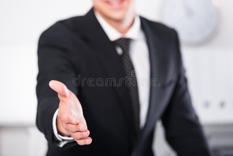 Businessman Offering Handshake Stock Photo - Image of lifestyles, deal ...