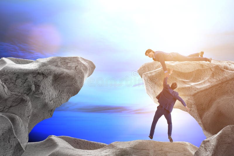 The Businessman Offering Helping Hand To Falling Colleague Stock Image ...